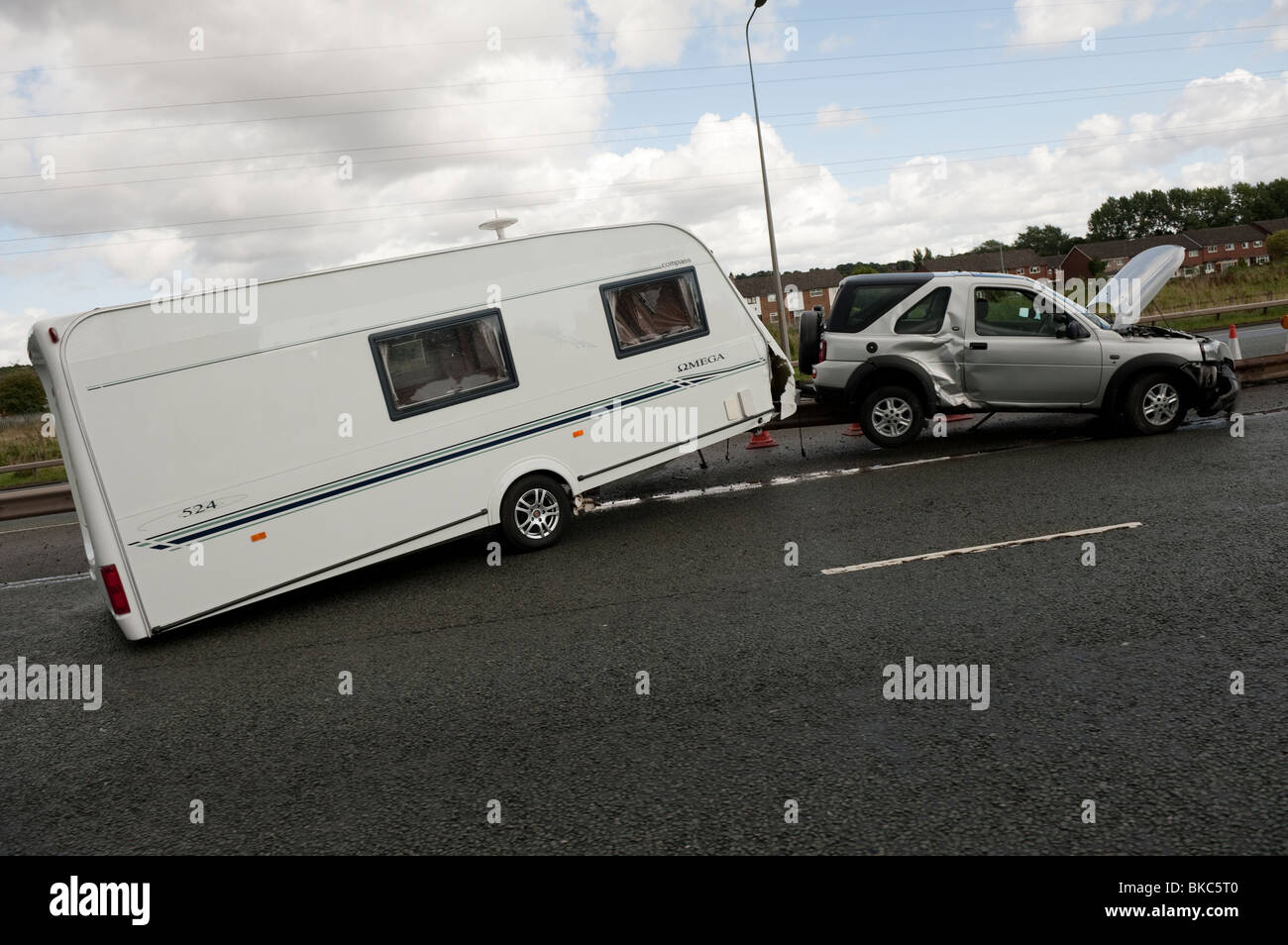 Caravan crashed on Motorway Stock Photo - Alamy
