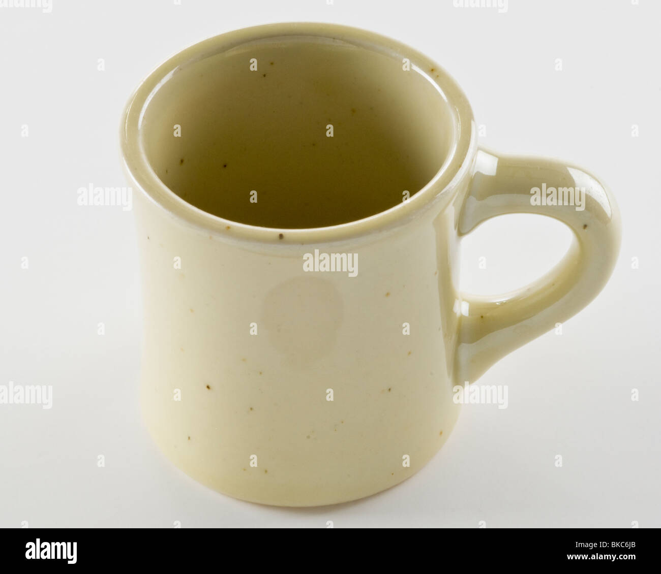 Iconic ceramic coffee mug with handle on right Stock Photo - Alamy