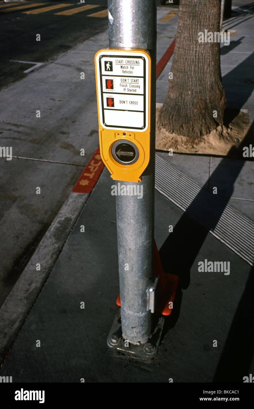 pedestrian street crossing control button Stock Photo - Alamy