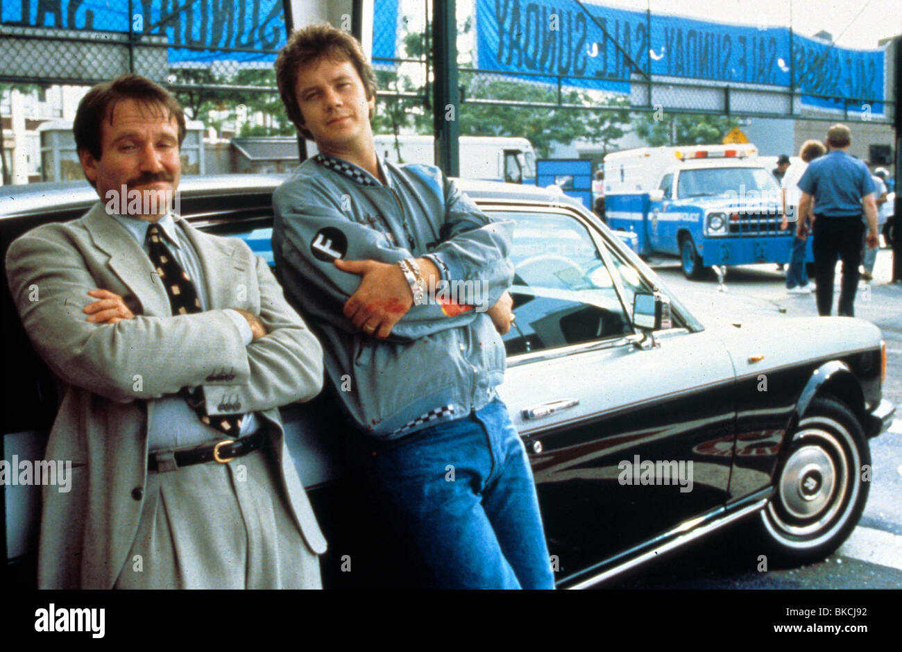 CADILLAC MAN (1990) ROBIN WILLIAMS, TIM ROBBINS CDM 043 Stock Photo - Alamy