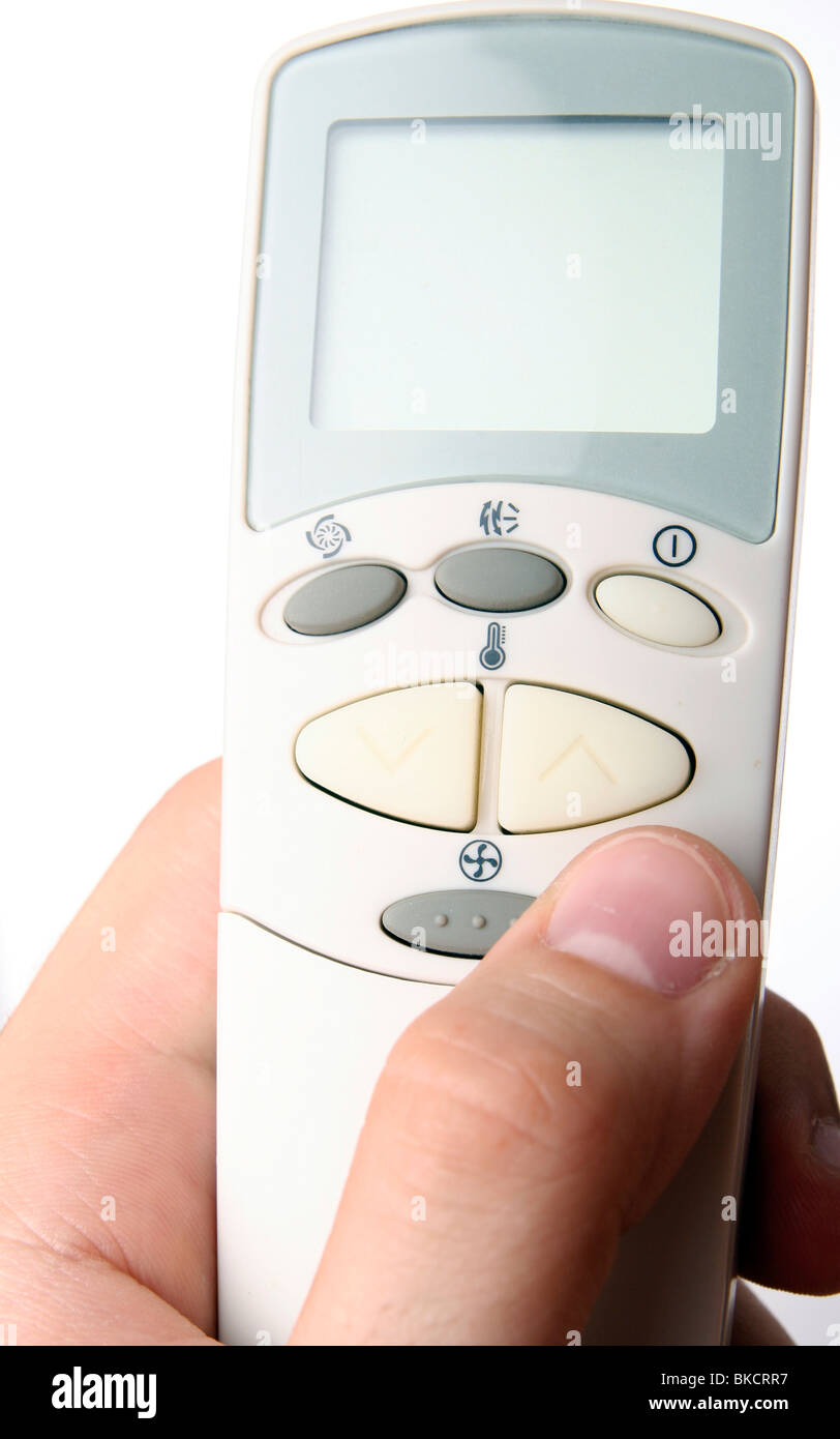 Remote control in a man hand. Isolated on white background Stock Photo ...