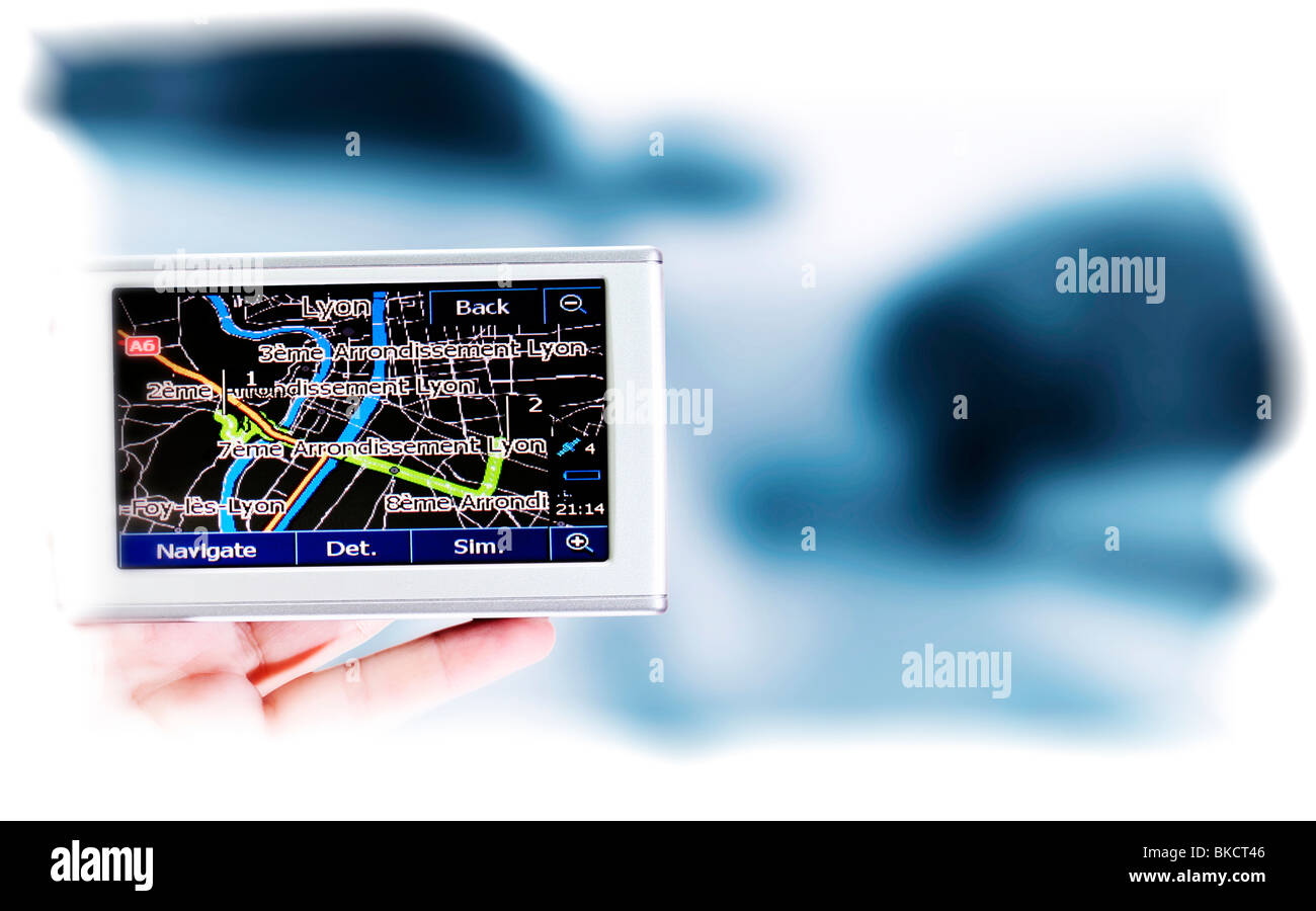 Gps in a man hand. Find your way ! Stock Photo - Alamy
