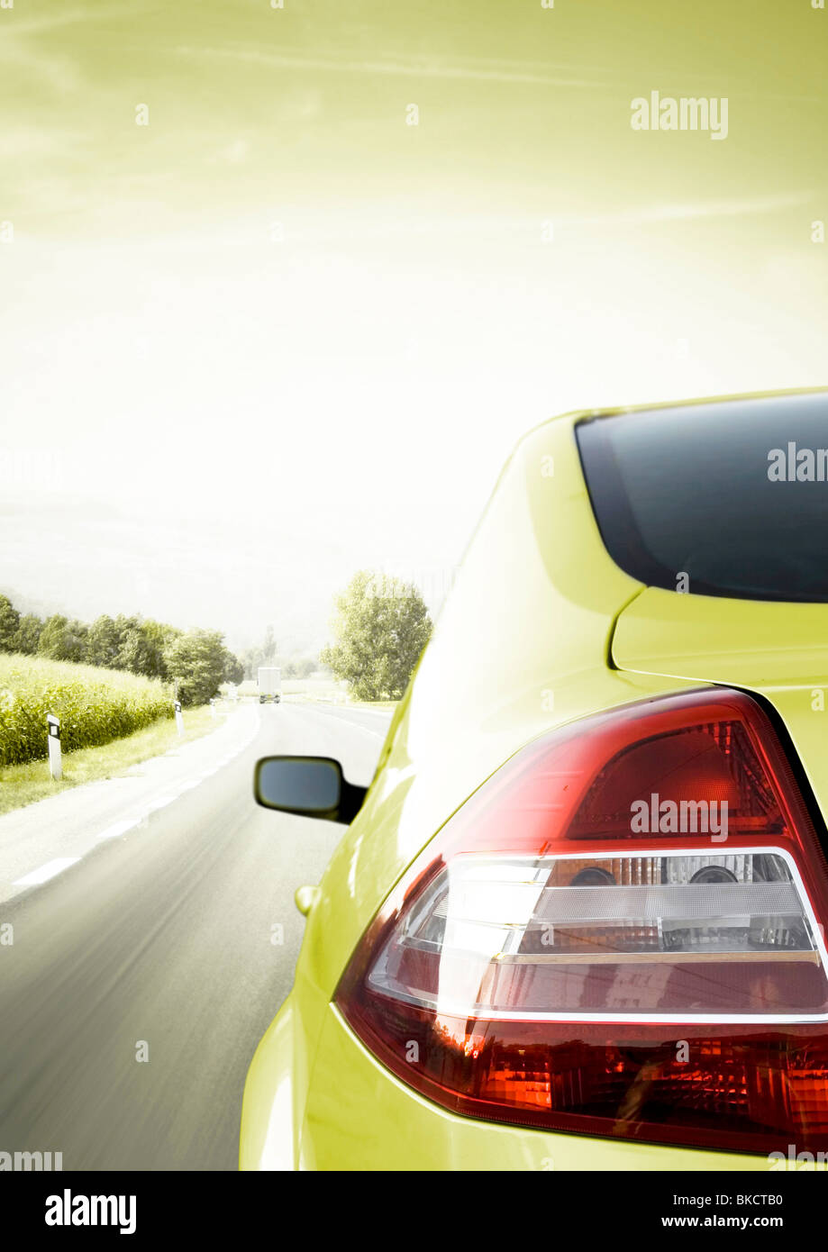 Car detail - back side, half. On the road Stock Photo - Alamy