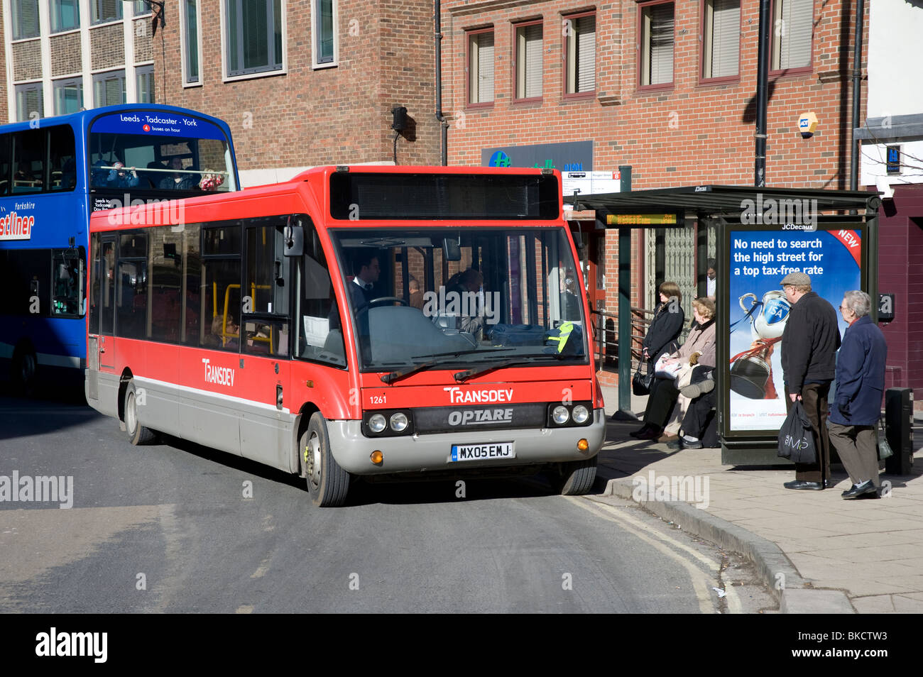 Bus at a bus stop in a city centre in England Stock Photo - Alamy