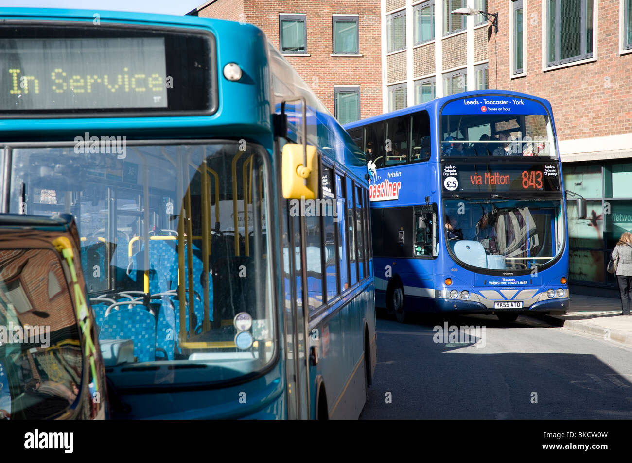 Buses at a bus stop in a city centre in England Stock Photo - Alamy
