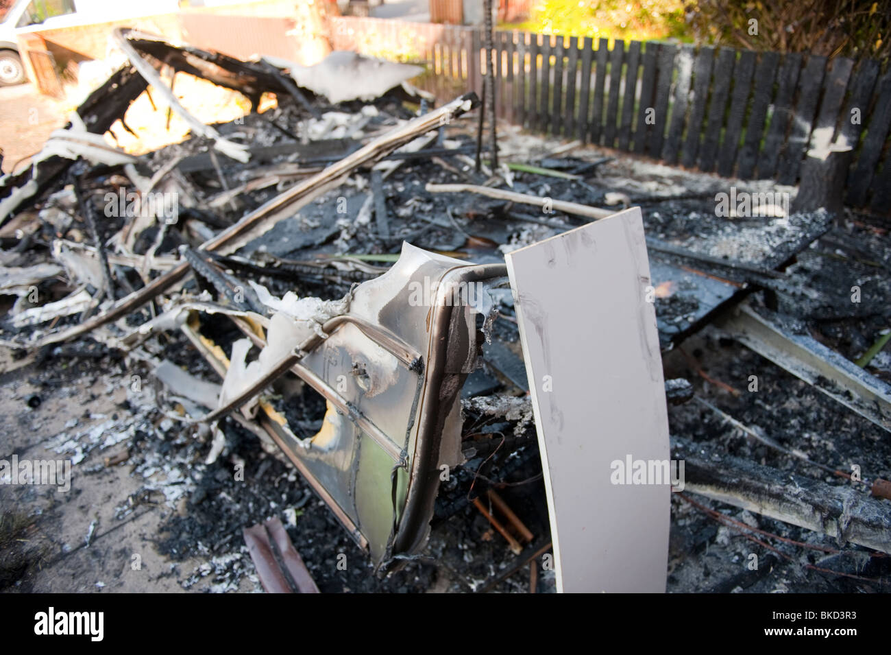 Burnt out touring caravan melted following fire Stock Photo - Alamy