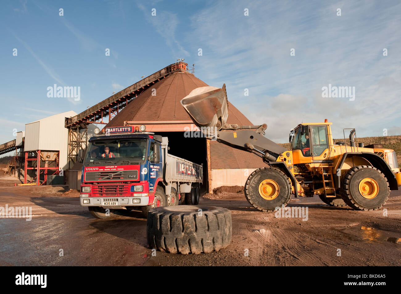 Loading Rock Road salt into lorry at mine Stock Photo - Alamy
