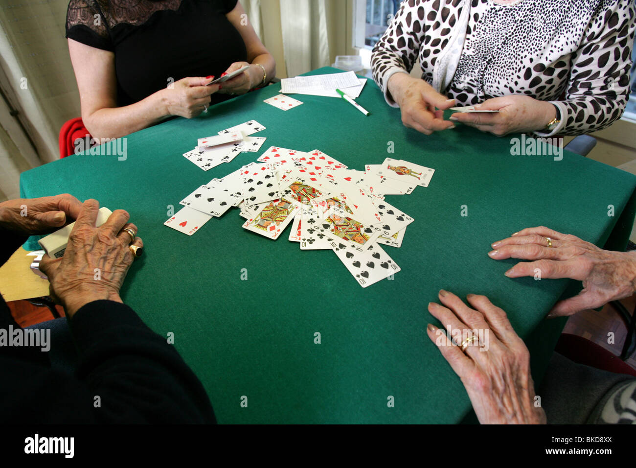 Old women playing cards hi-res stock photography and images - Alamy
