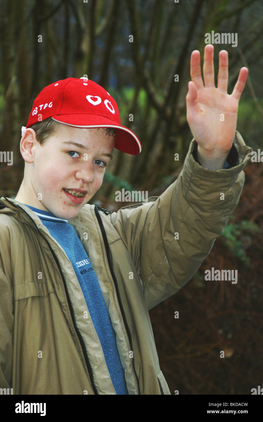 Teen waving goodbye hi-res stock photography and images - Alamy
