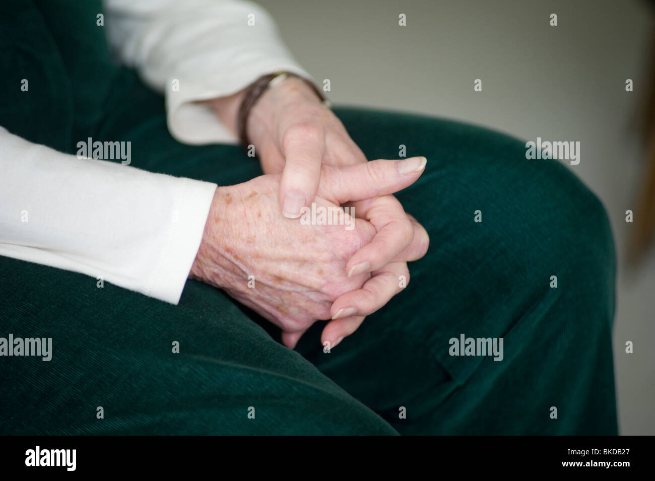 Old clasped hands hi-res stock photography and images - Alamy