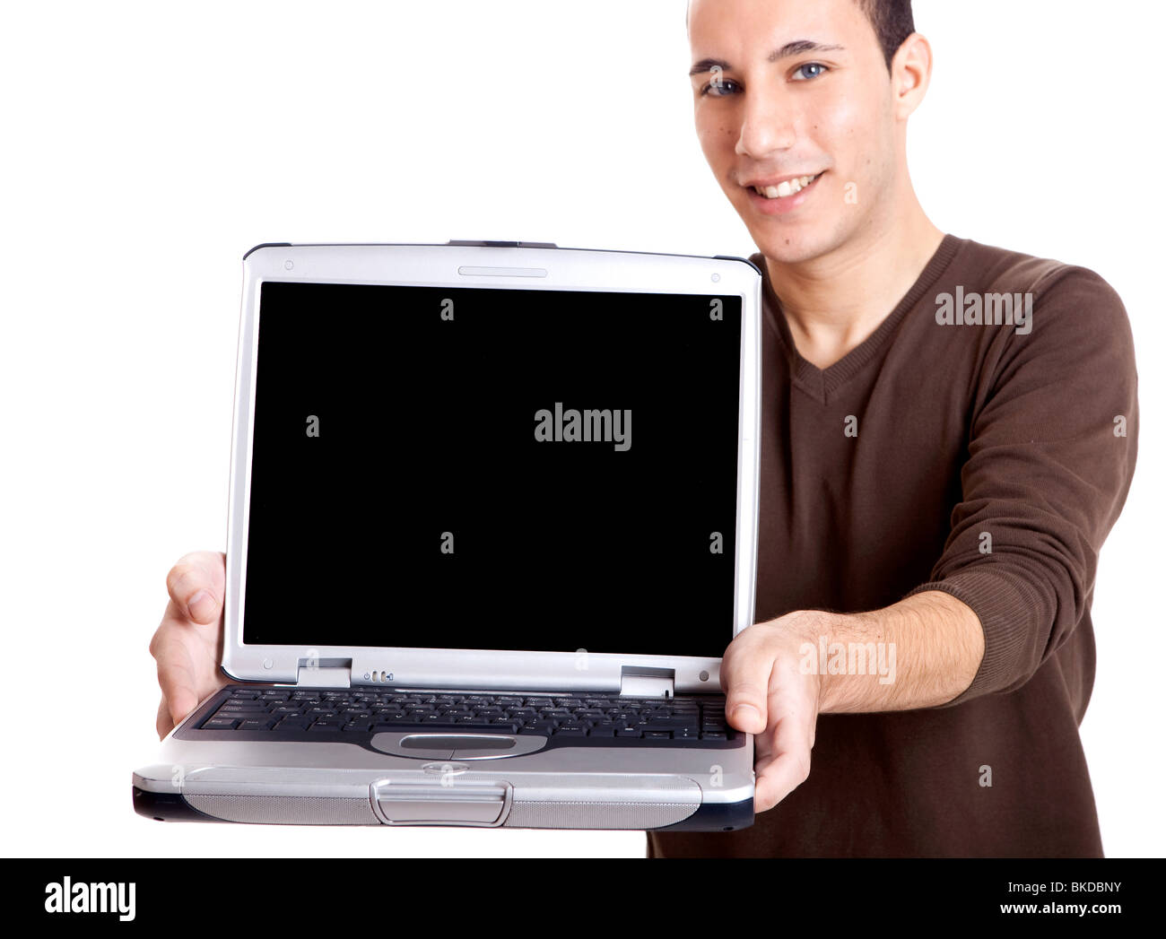 Young man showing a work presentation on the laptop, isolated on white ...