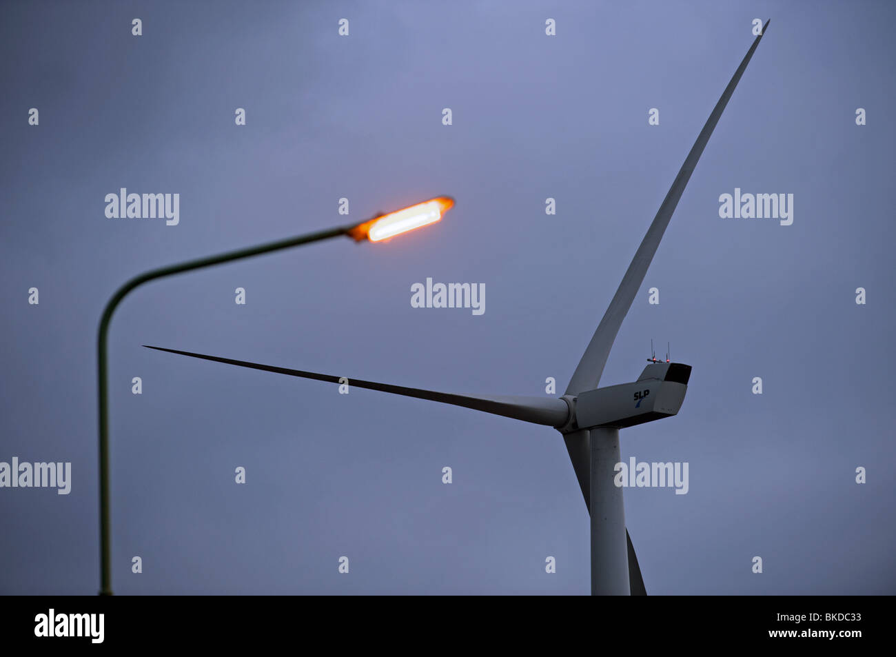 Wind turbine and street light Stock Photo - Alamy