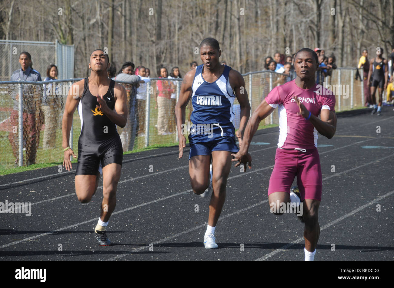 3 teens competing in a track meet Stock Photo - Alamy
