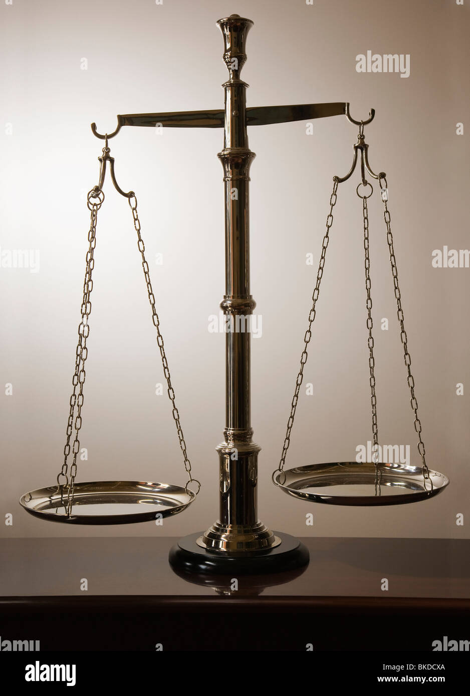 Scale of Justice on table, close up Stock Photo - Alamy