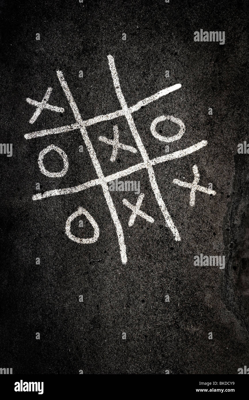 Noughts and Crosses game on paving Stock Photo - Alamy