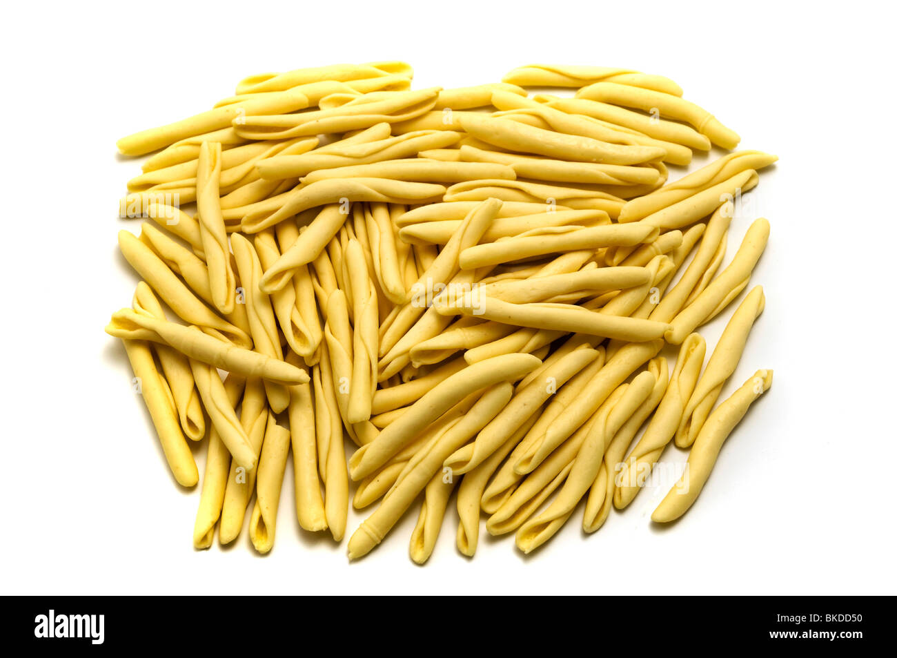 Italian homemade fusilli on a white background Stock Photo - Alamy