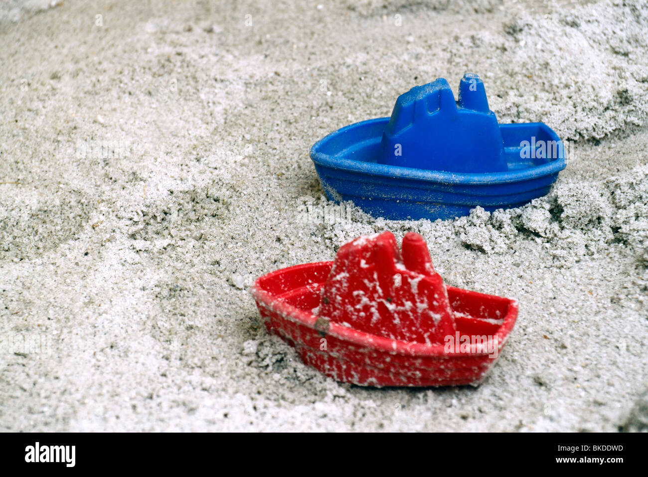 Children toy boat in a playground sandbox Stock Photo - Alamy