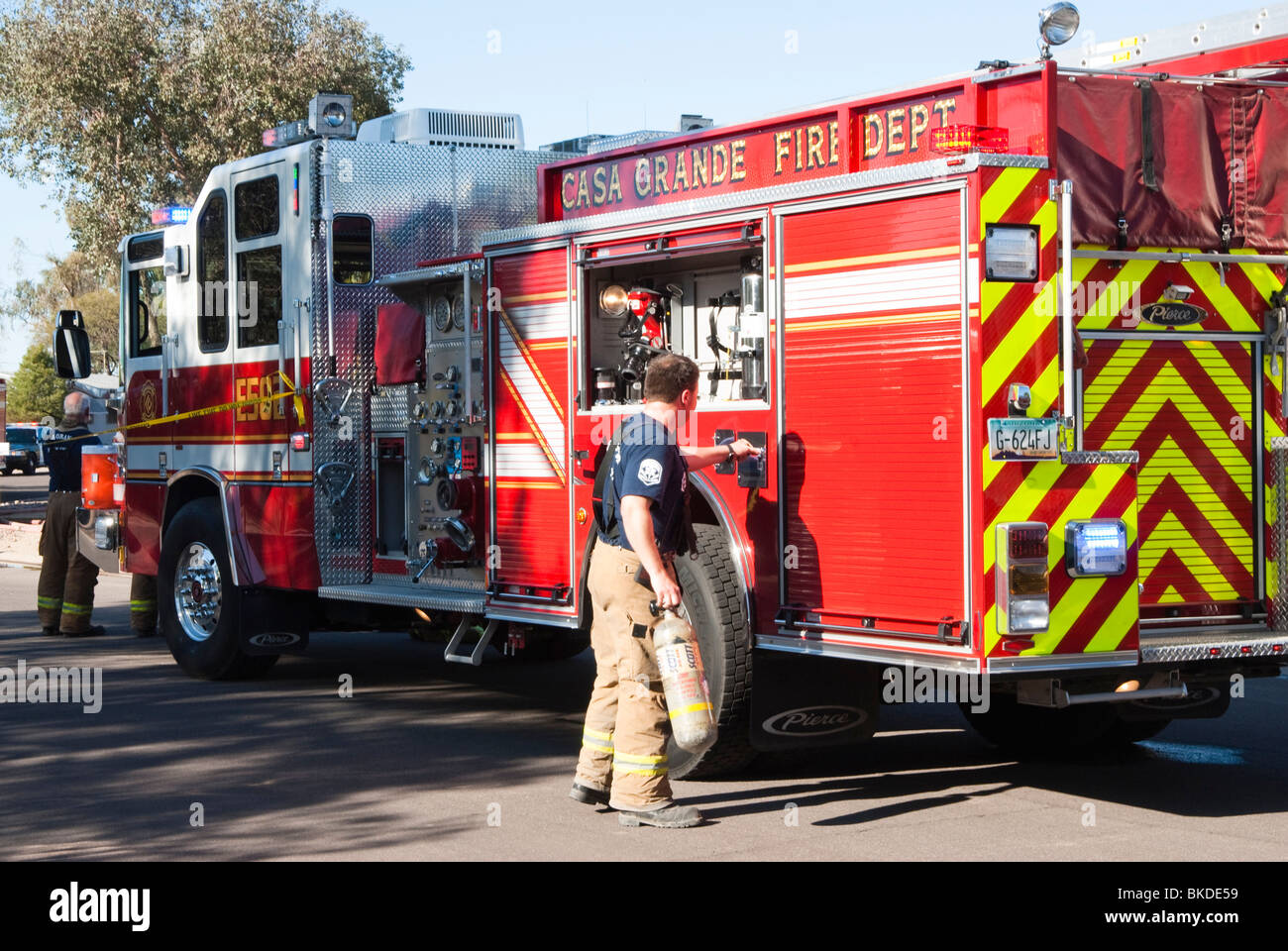firefighters respond to a house fire in a residential area Stock Photo ...