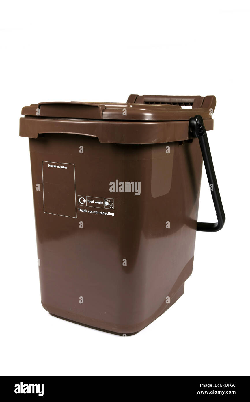 A Brown food waste recycling dustbin against a white background Stock ...