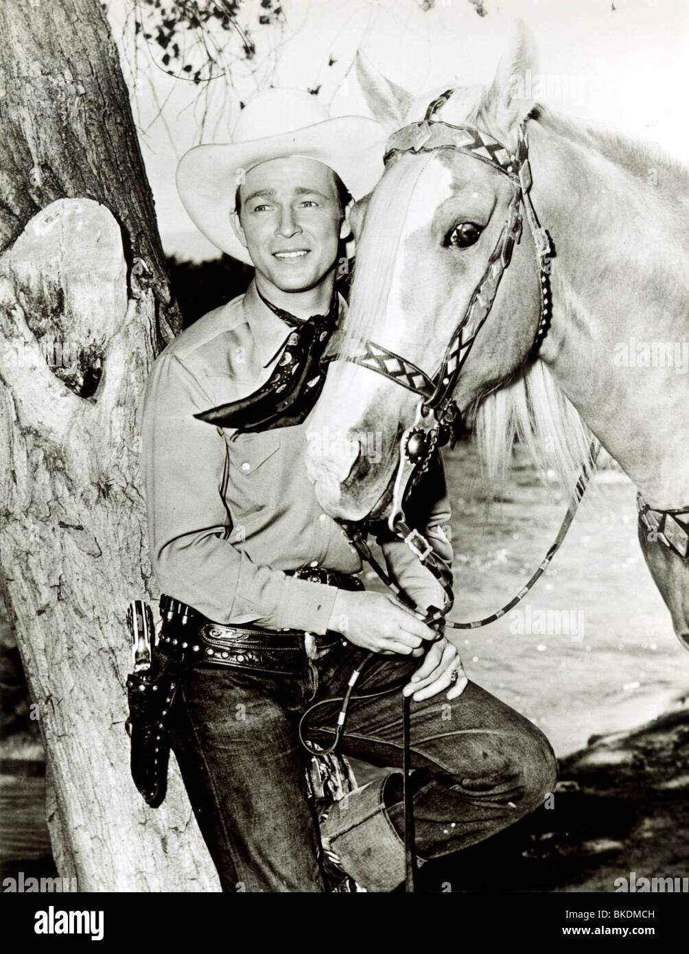 ROY ROGERS PORTRAIT WITH HIS HORSE TRIGGER RRGR 001P Stock Photo - Alamy