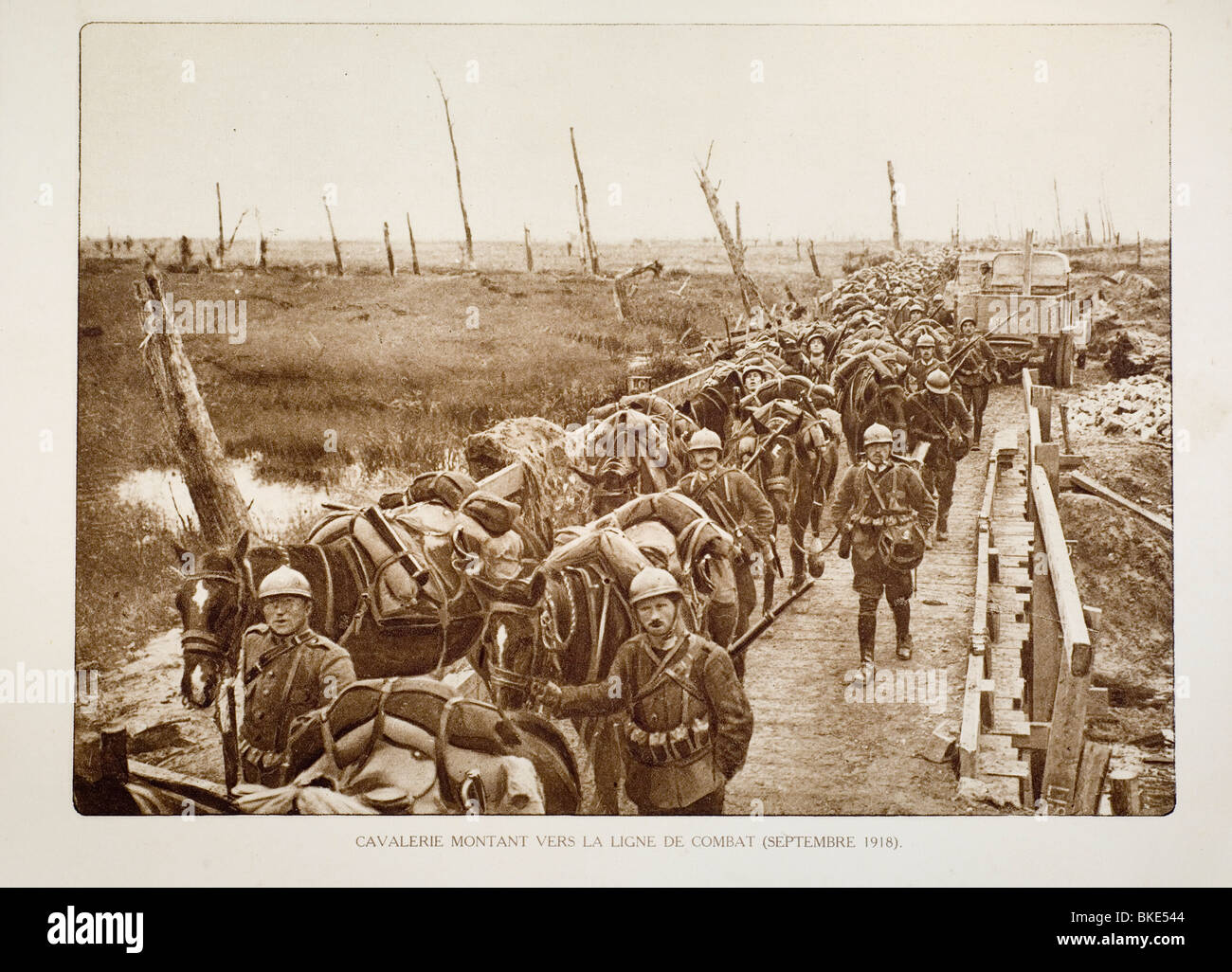 WW1 Belgian cavalry heading for battlefield through bombarded terrain ...
