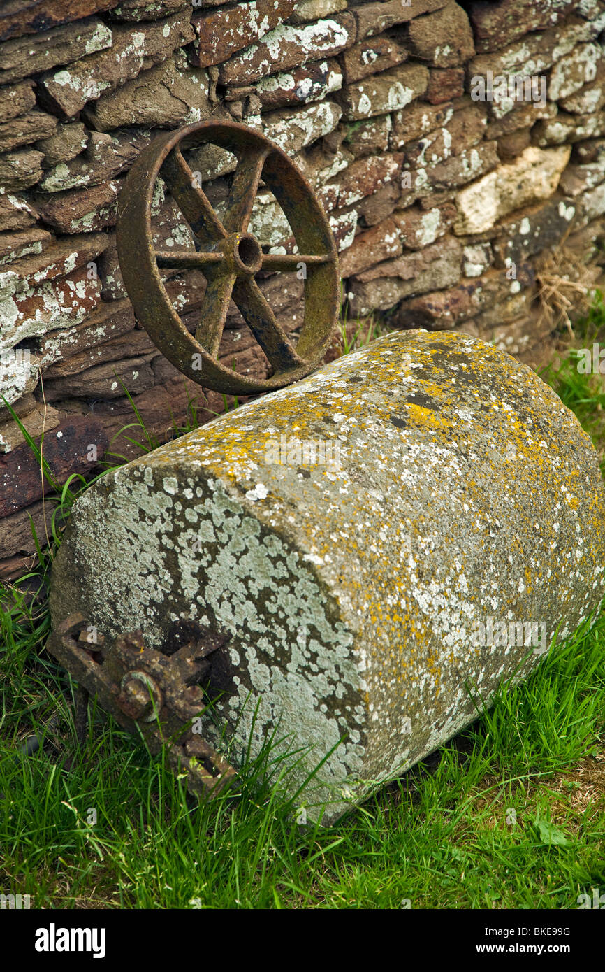 Cast iron wheel and stone lawn roller Stock Photo - Alamy