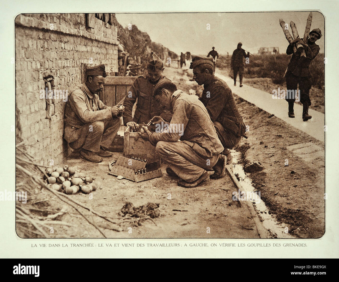 Belgian WW1 soldiers at bunker checking pins in hand grenades in West ...