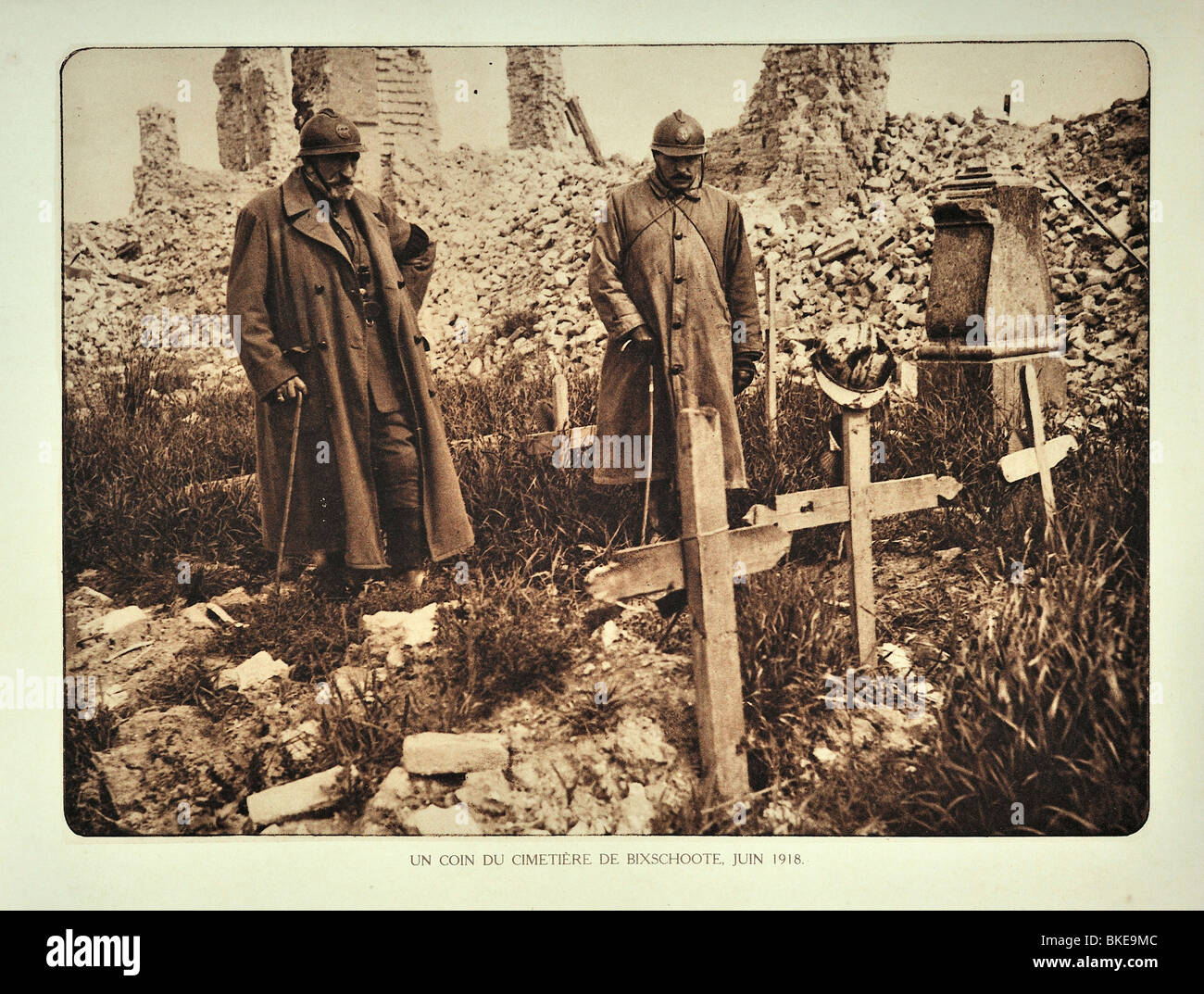 WW1 officers visiting improvised graves at the ruined village Bikschote ...