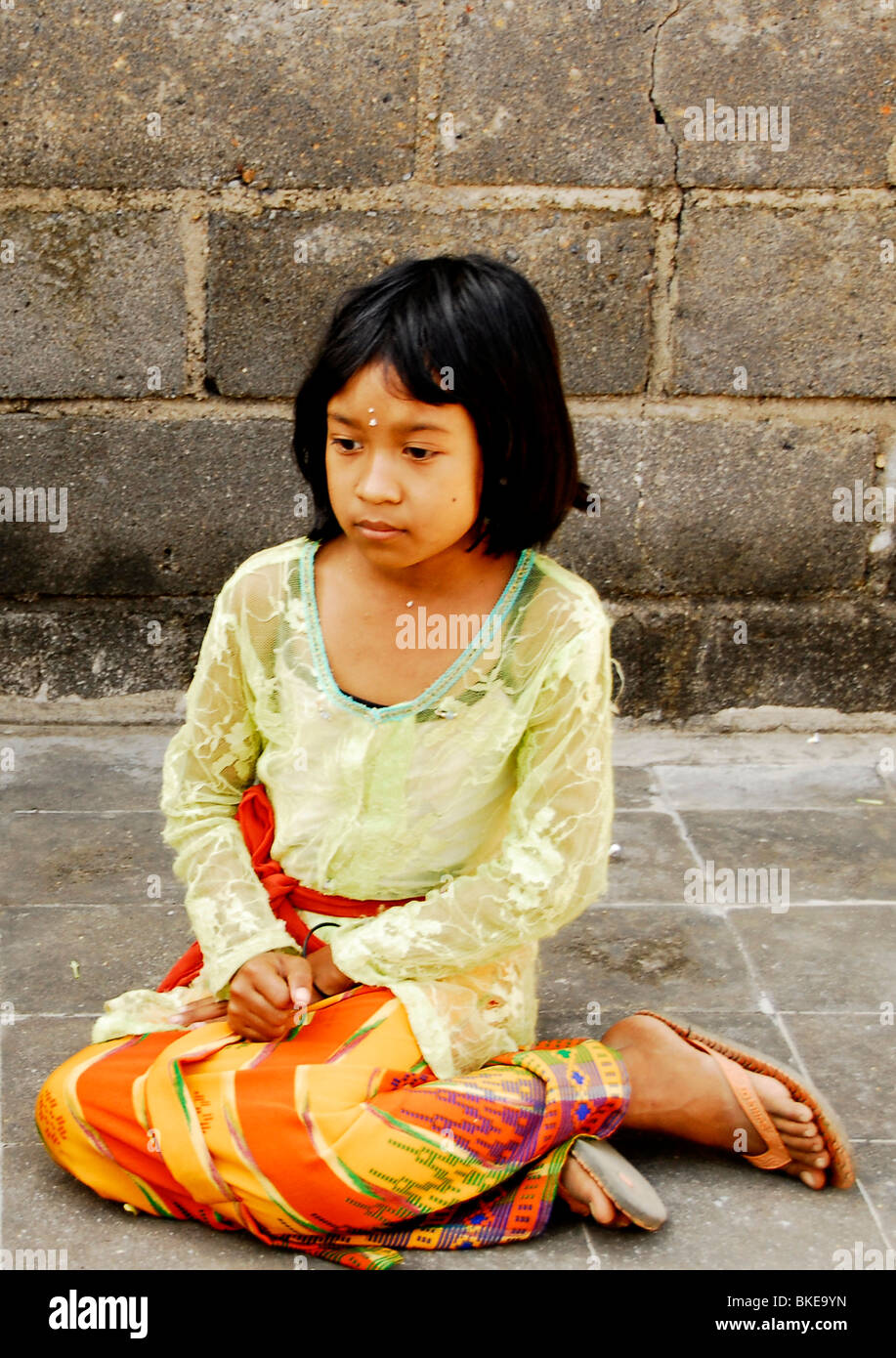 young balinese girl praying during galungan , Pura Sabakabian temple ...