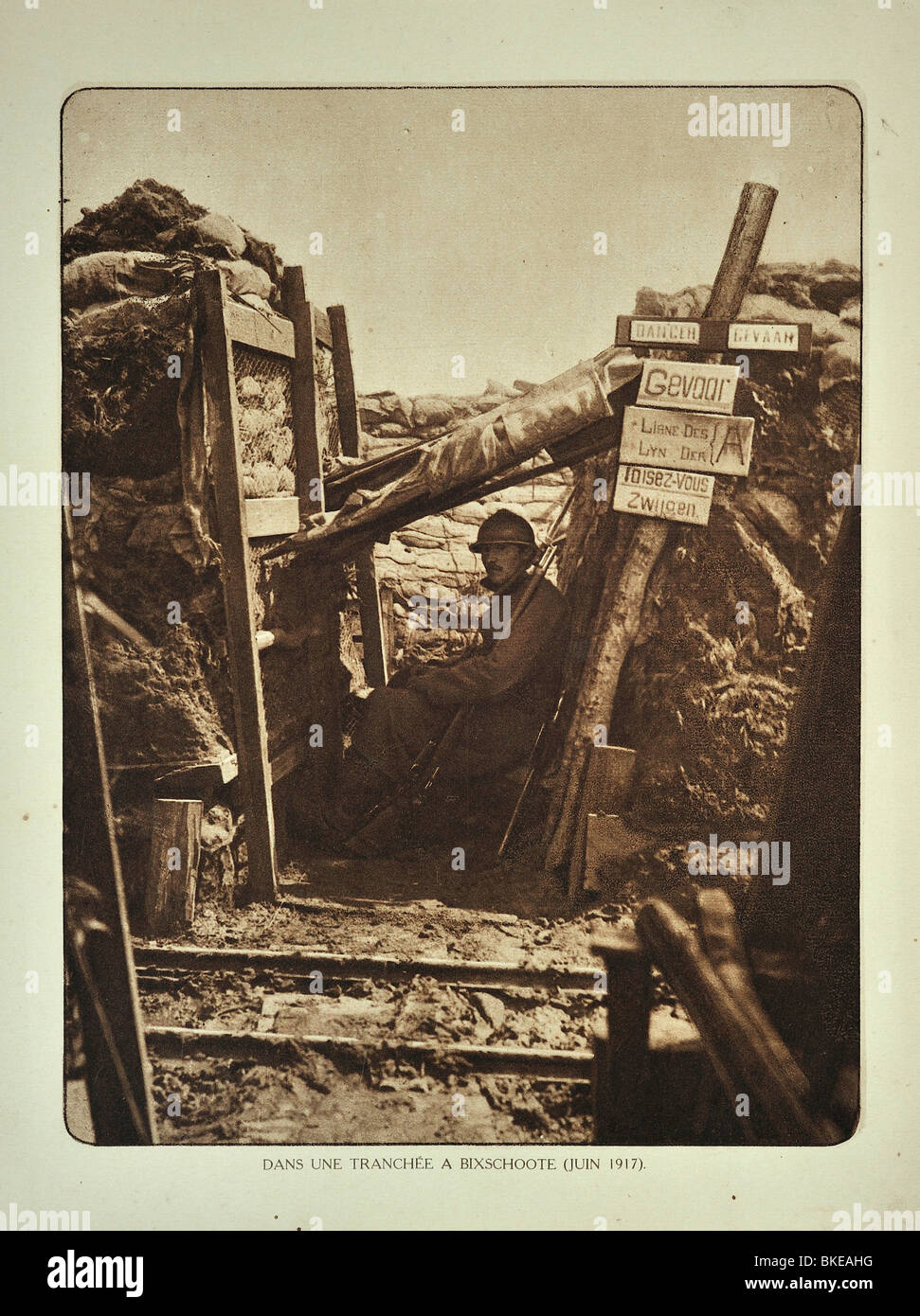 WW1 Belgian soldier / sentry sitting at listening post in trench ...