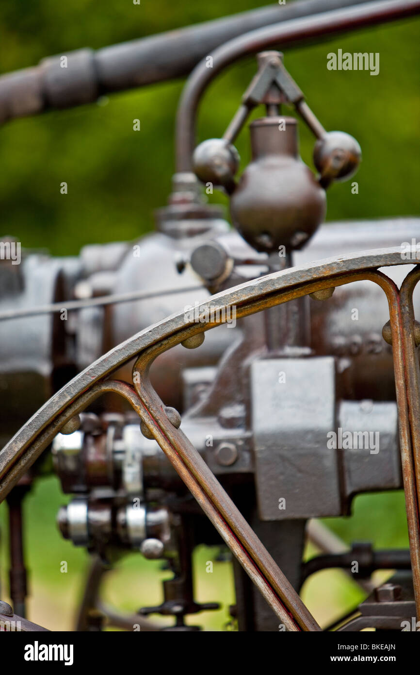 Fly wheel and speed regulator on a static steam engine Stock Photo - Alamy