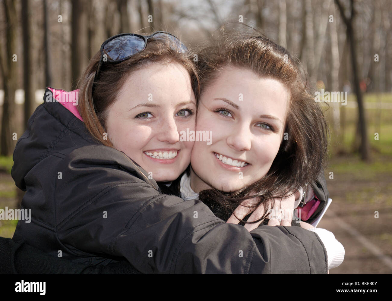 Two girls hug other in hi-res stock photography and images - Alamy
