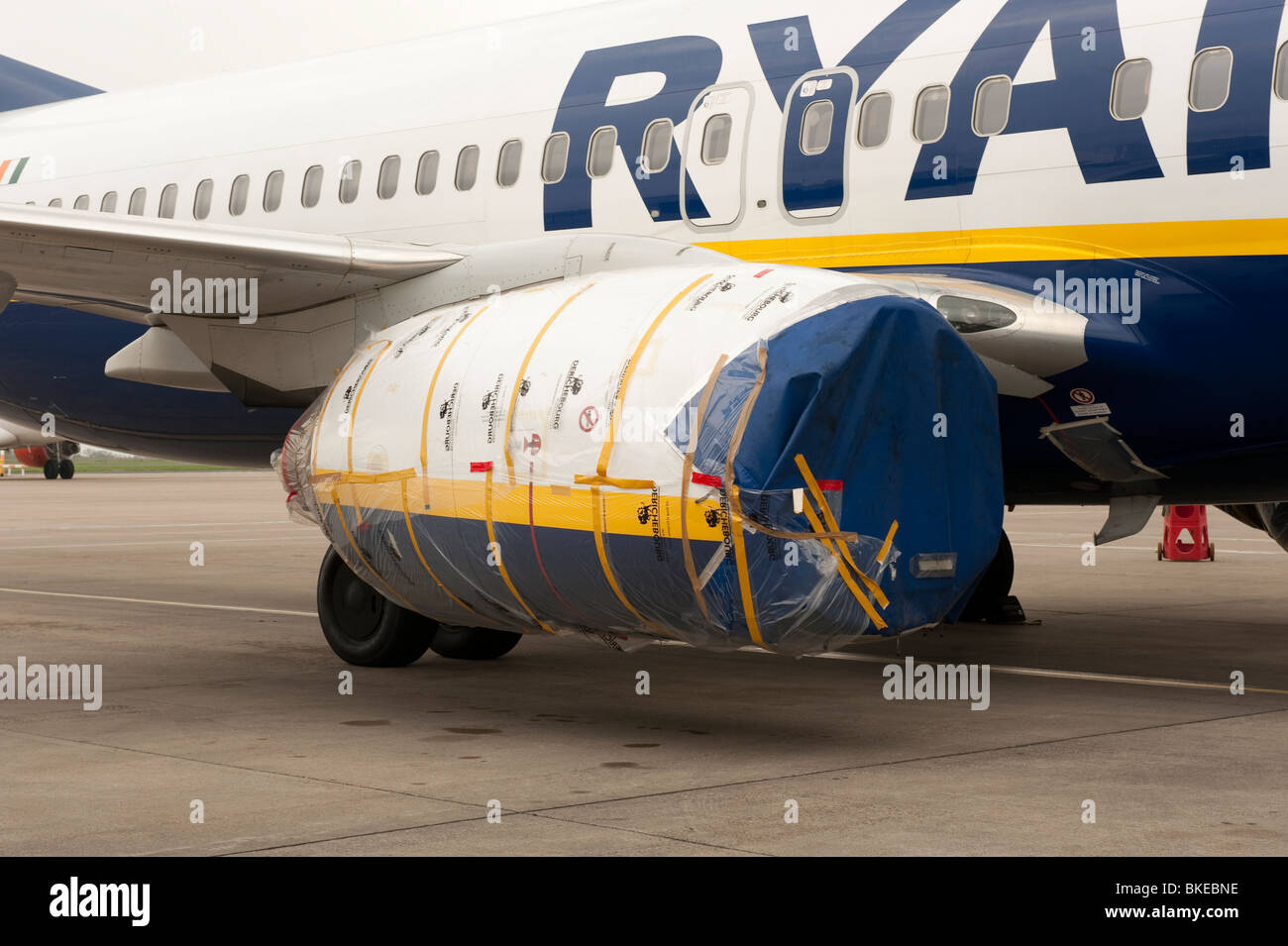 Ryanair plane with engine covered up in plastic to protect from ...