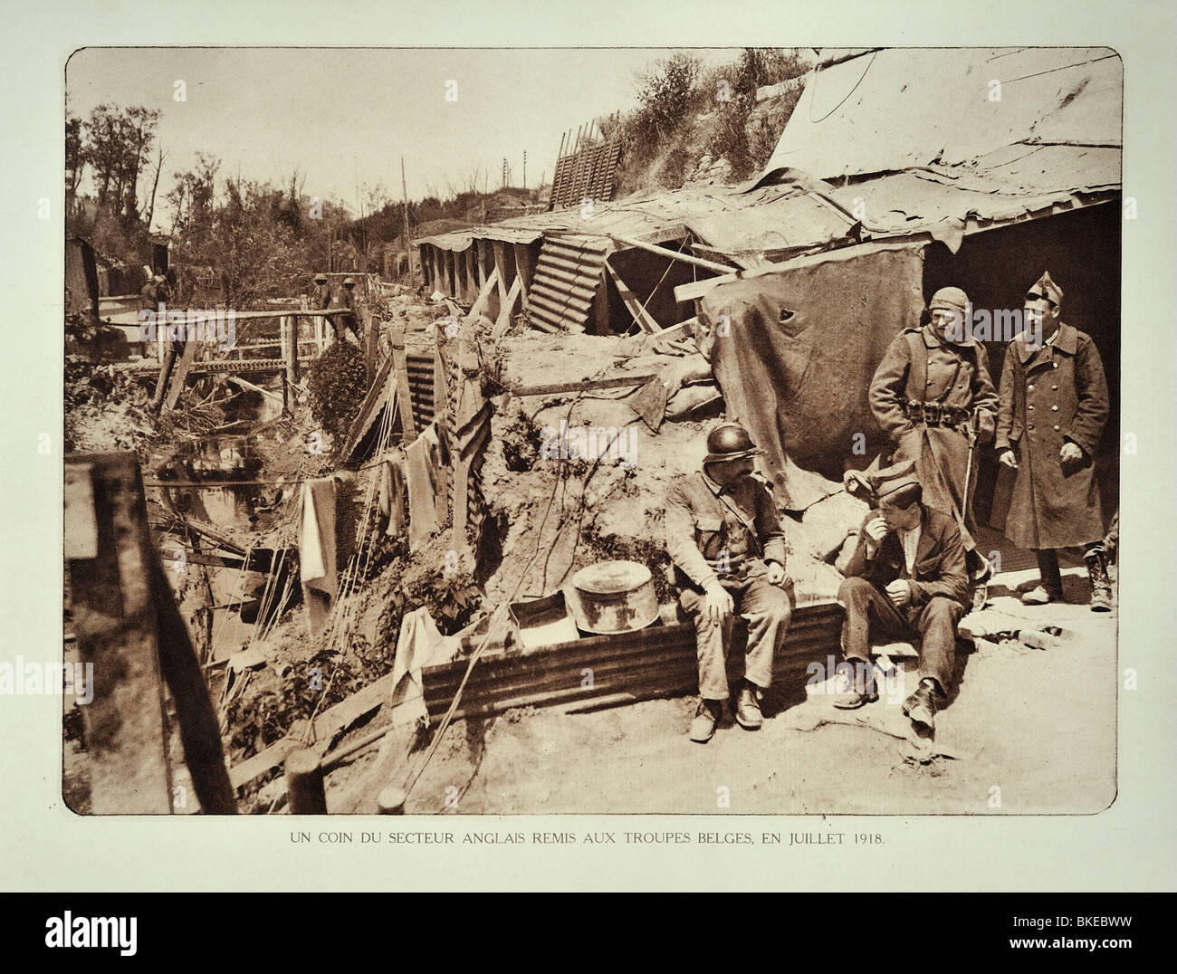 WWI Belgian soldiers at rest in trench at the English sector in West ...