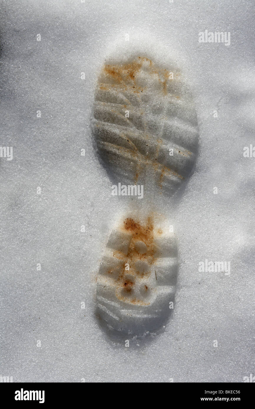 snow white soil single boot footprint winter Stock Photo - Alamy