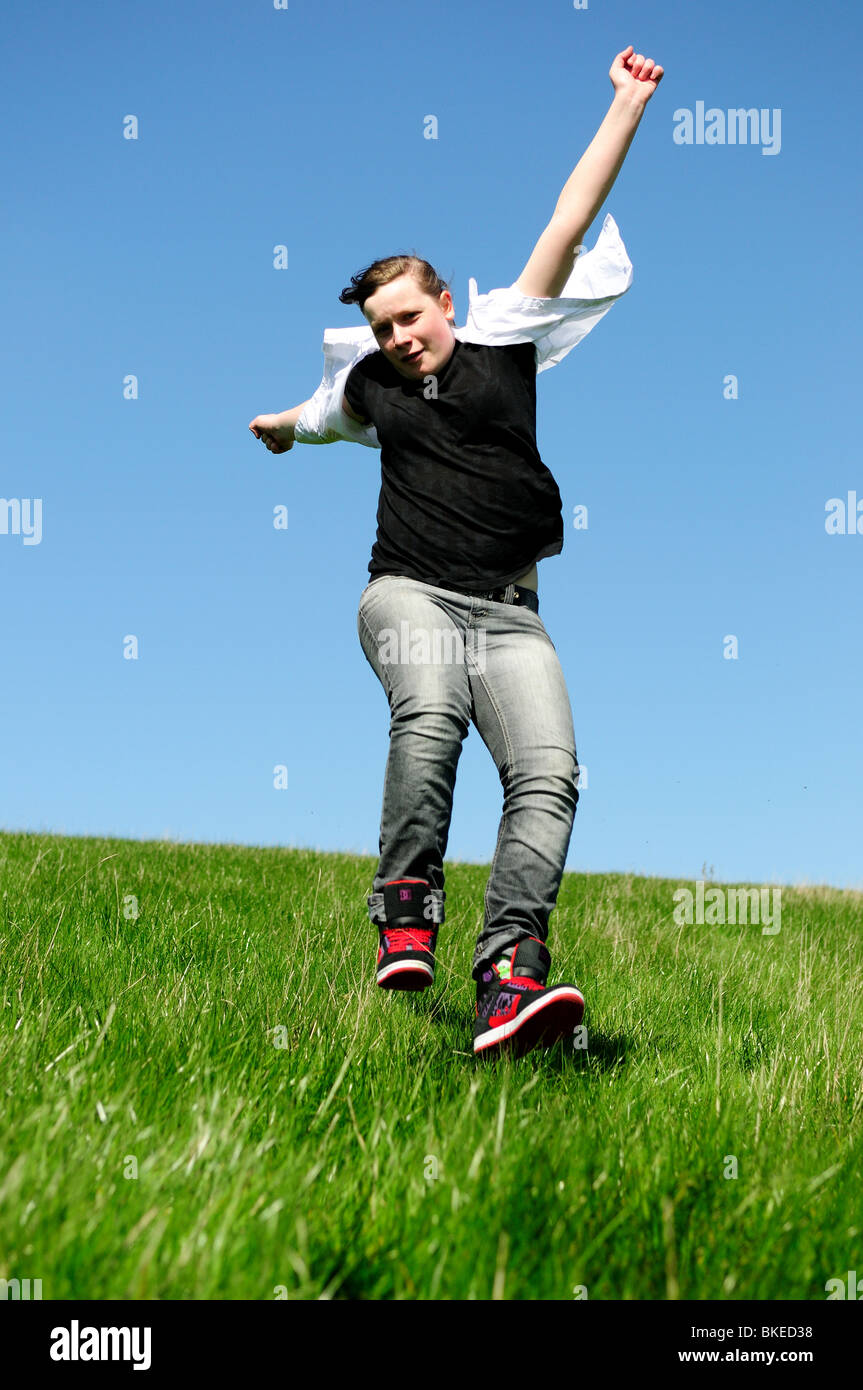 Teenager Jumping For Joy Stock Photo - Alamy