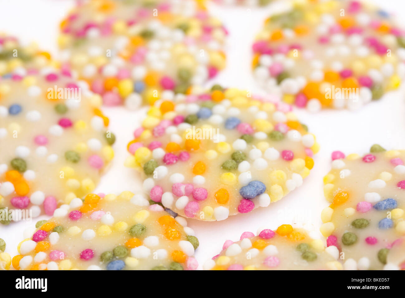 white chocolate buttons with sprinkles Stock Photo - Alamy