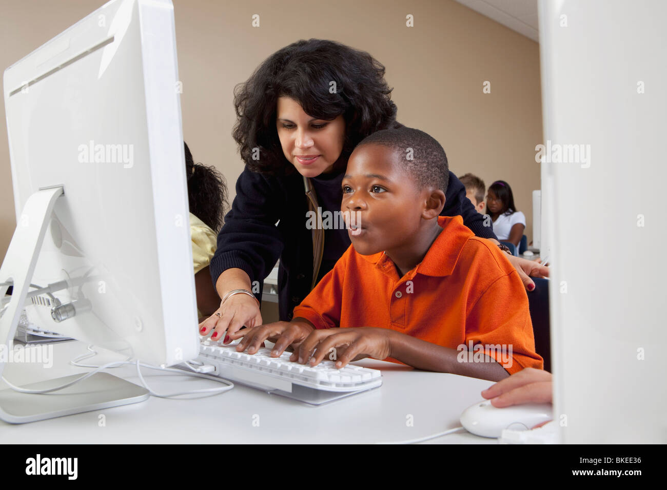Black teacher student computer hi-res stock photography and images - Alamy