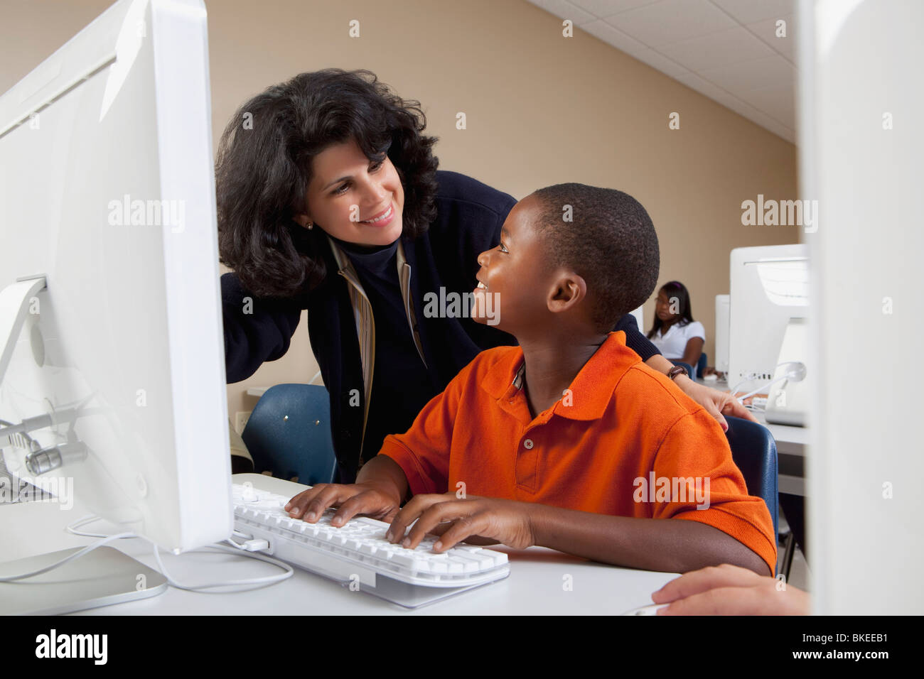 Black teacher student computer hi-res stock photography and images - Alamy