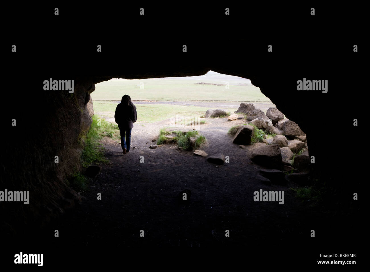 Woman exiting a cave. Laugarvatnshellar caves, South Iceland. People ...