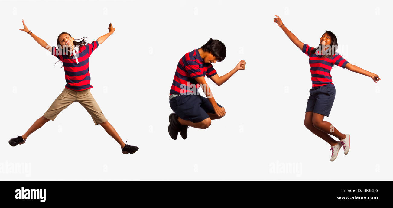 Three Teenagers Jumping Stock Photo - Alamy