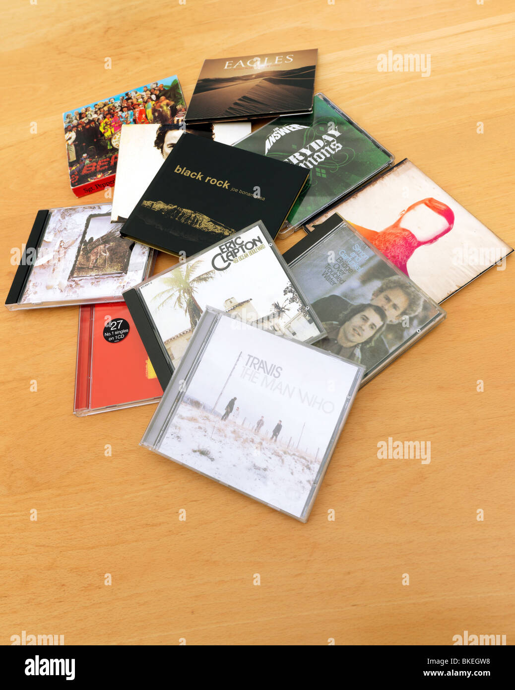 Pile Of Compact Discs Spread Out On Table Stock Photo - Alamy