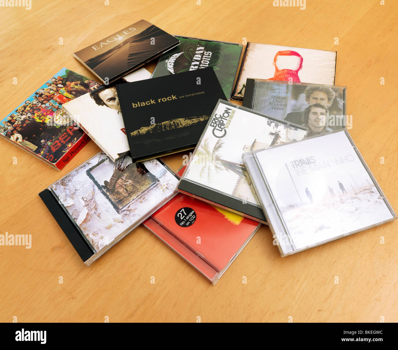 Pile Of Compact Discs Spread Out On Table Stock Photo - Alamy