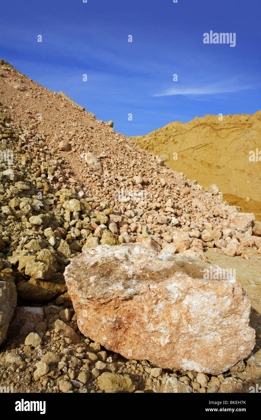 sand quarry mounds of varied construction sands color Stock Photo - Alamy