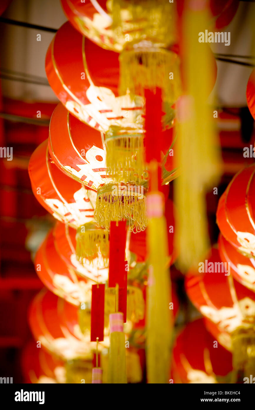 Red Chinese lanterns hanging from the ceiling Stock Photo - Alamy