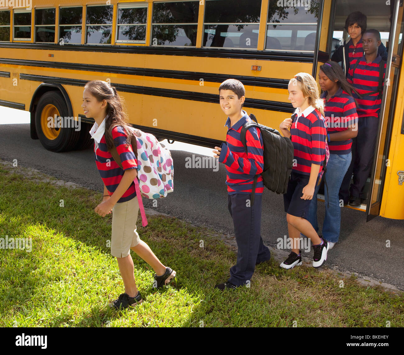 Teen Boy And Girl School Bus Stock Photos & Teen Boy And Girl School ...