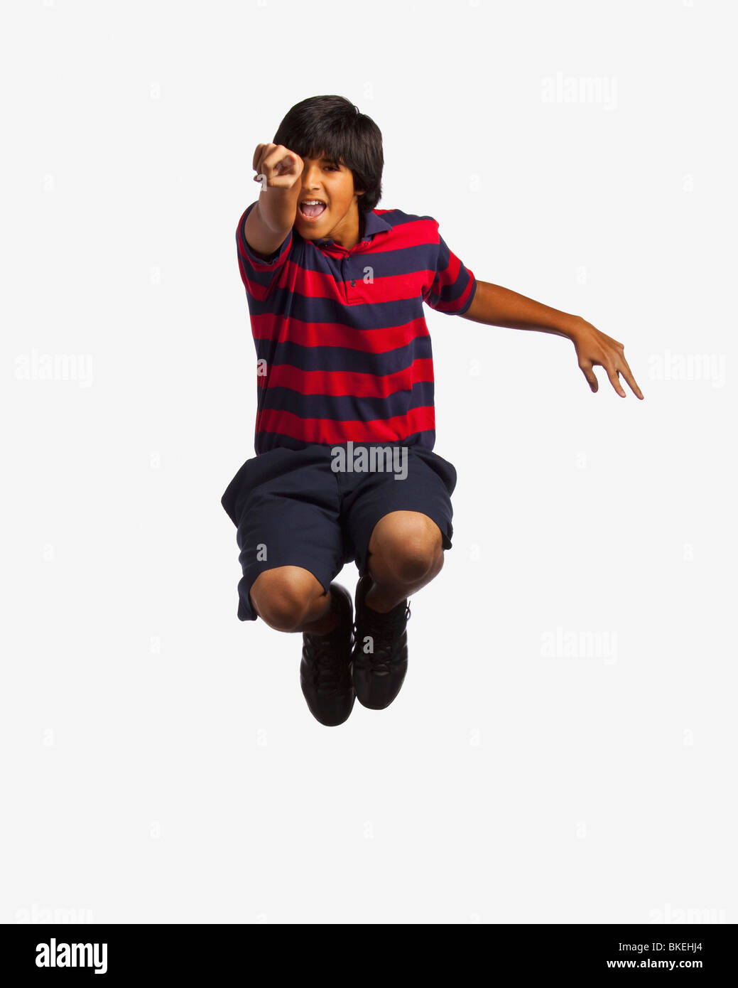 Child jumping for joy at school Cut Out Stock Images & Pictures - Alamy