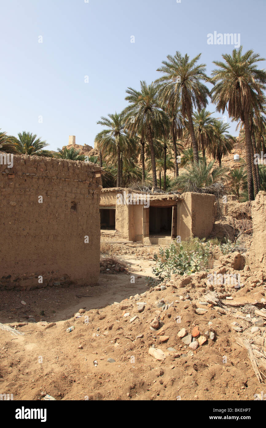 old adobe village of Fanja in wadi with date palm trees, Sultanate of ...