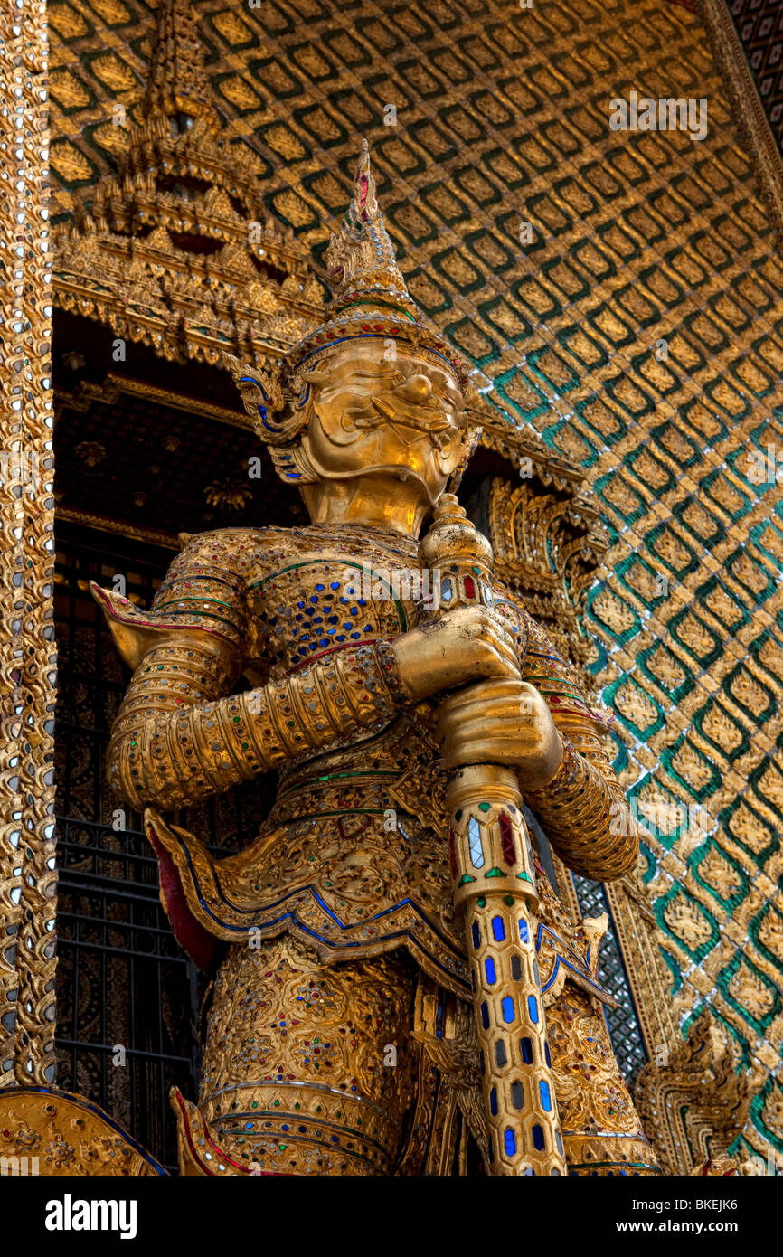 Statue 'guarding' the entrance to a temple at the Grand Palace in ...