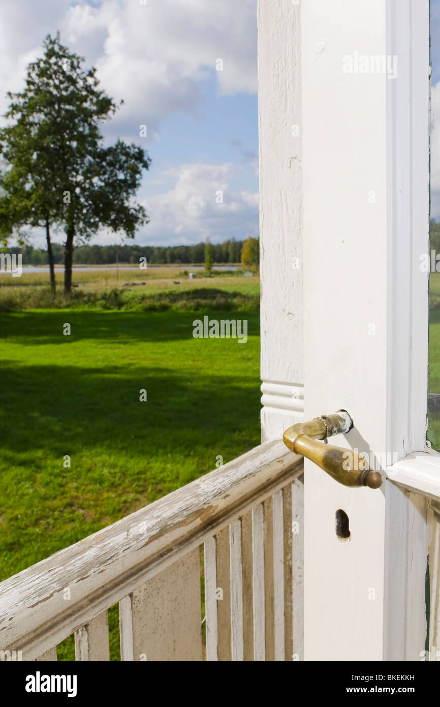 Old-fashioned glass door standing ajar Stock Photo - Alamy